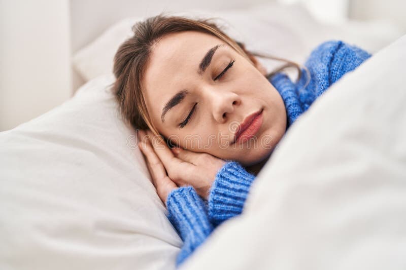 Young Beautiful Hispanic Woman Lying on Bed Sleeping at Bedroom Stock ...
