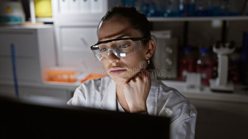 Young Beautiful Hispanic Woman Scientist Wearing Glasses Using Computer ...