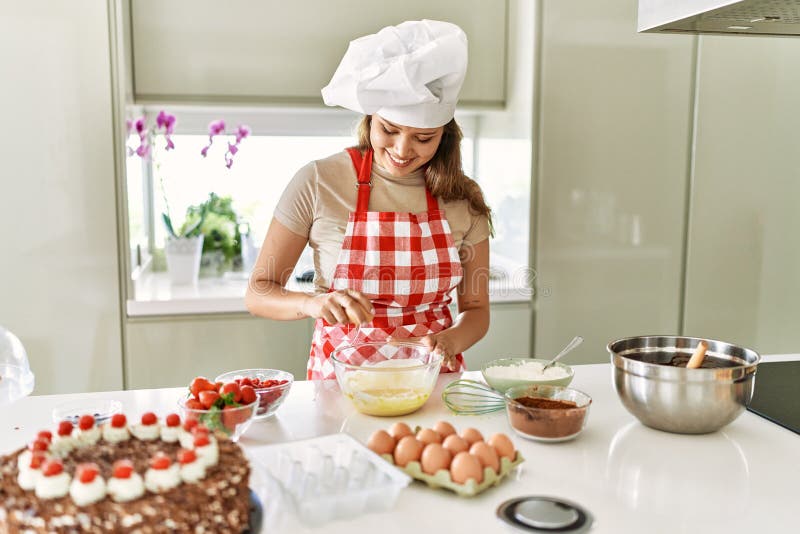 Young Beautiful Hispanic Woman Smiling Confident Breaking Egg at the ...