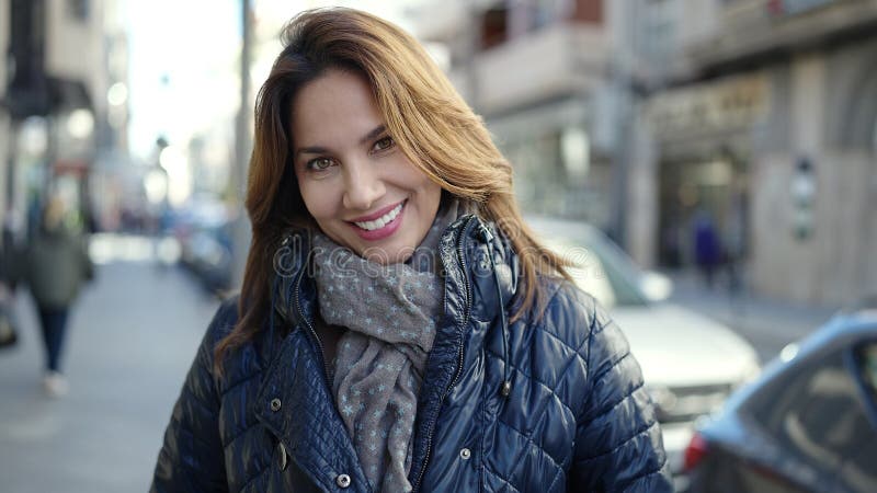 Young Beautiful Hispanic Woman Smiling Confident Standing at Street ... Young Beautiful Hispanic Woman Smiling Confident Standing at Street ...