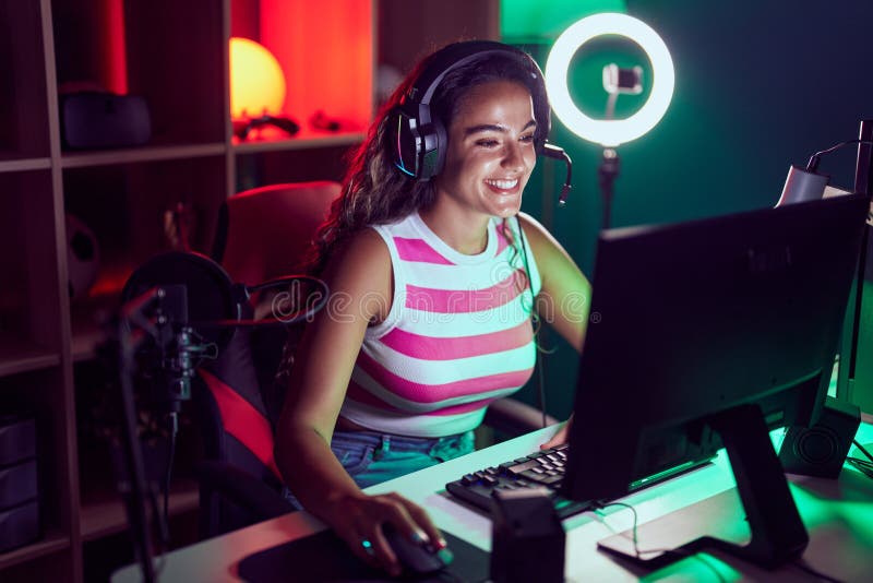 Young Beautiful Hispanic Woman Streamer Playing Video Game Using ...