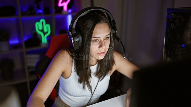 Young Beautiful Hispanic Woman Streamer Playing Video Game Using ...