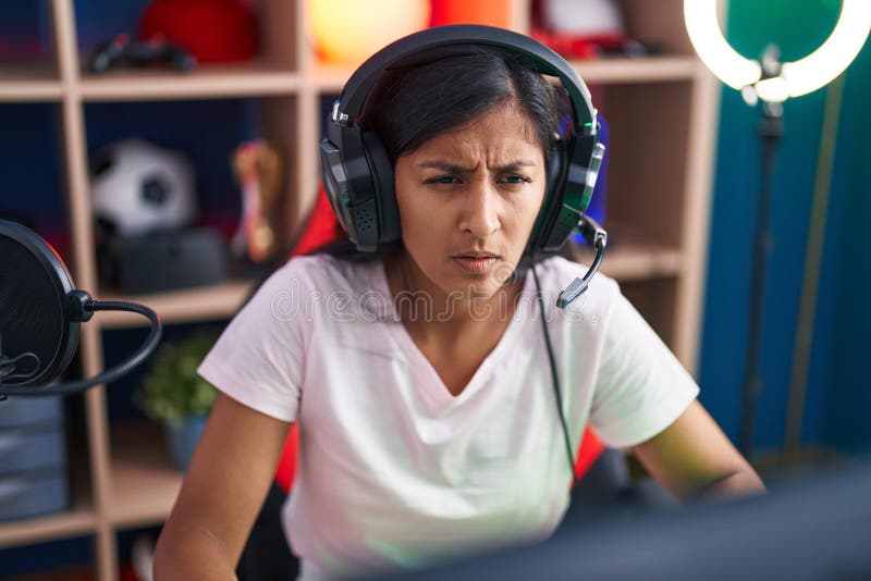 Young Beautiful Hispanic Woman Streamer Playing Video Game Using ...