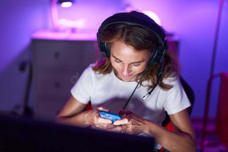 Young Beautiful Hispanic Woman Streamer Using Computer and Smartphone ...