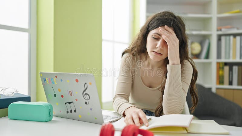 Young Beautiful Hispanic Woman Student Stressed Using Laptop at Library ...