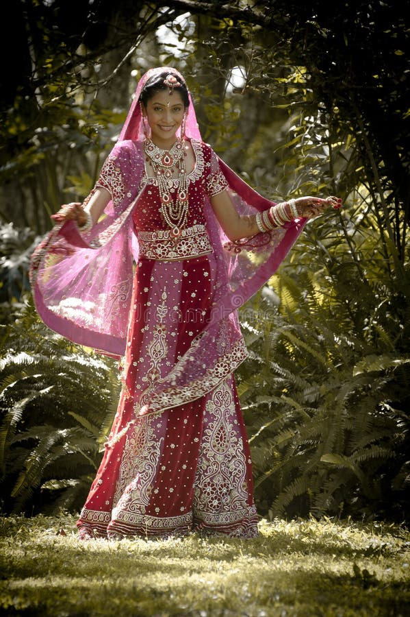 Young Beautiful Indian Hindu Bride Sitting Under Tree