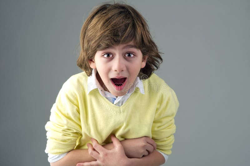 Young Beautiful Kid with Shocking Painful Expression Stock Image ...