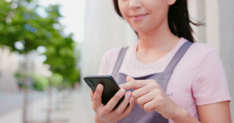 Beatiful Lady Using a Phone Outdoors Stock Image - Image of connected ...