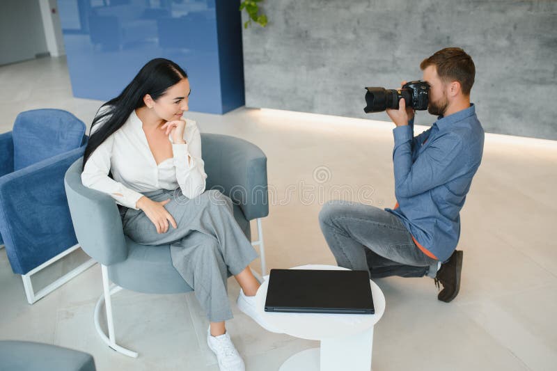 Young Beautiful Model Posing for Professional Photographer in Studio ...