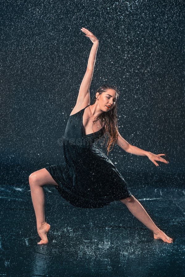 The Young Beautiful Modern Dancer Dancing Under Water Drops Stock Photo ...