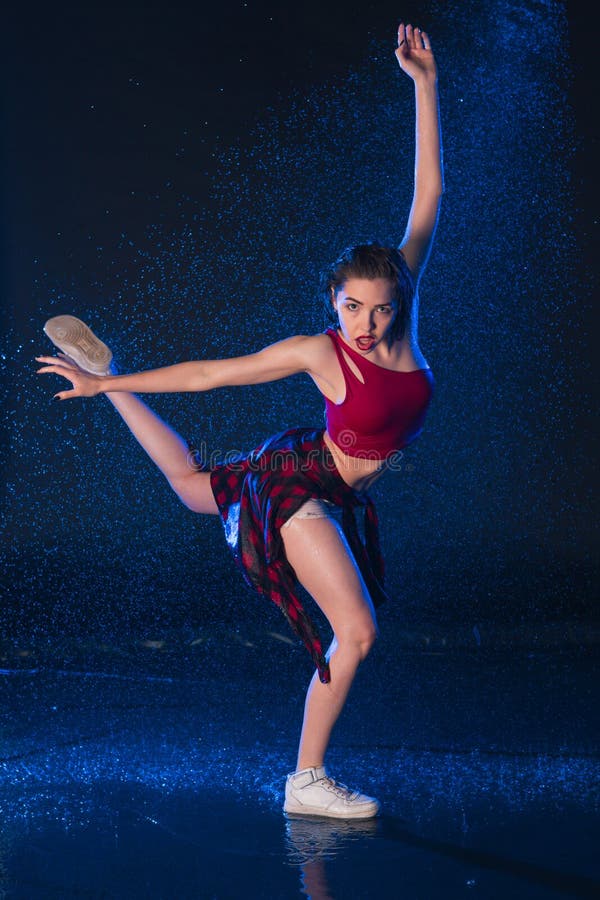 The Young Beautiful Modern Dancer Dancing Under Water Drops Stock Photo ...