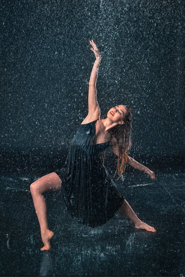 The Young Beautiful Modern Dancer Dancing Under Water Drops Stock Photo ...