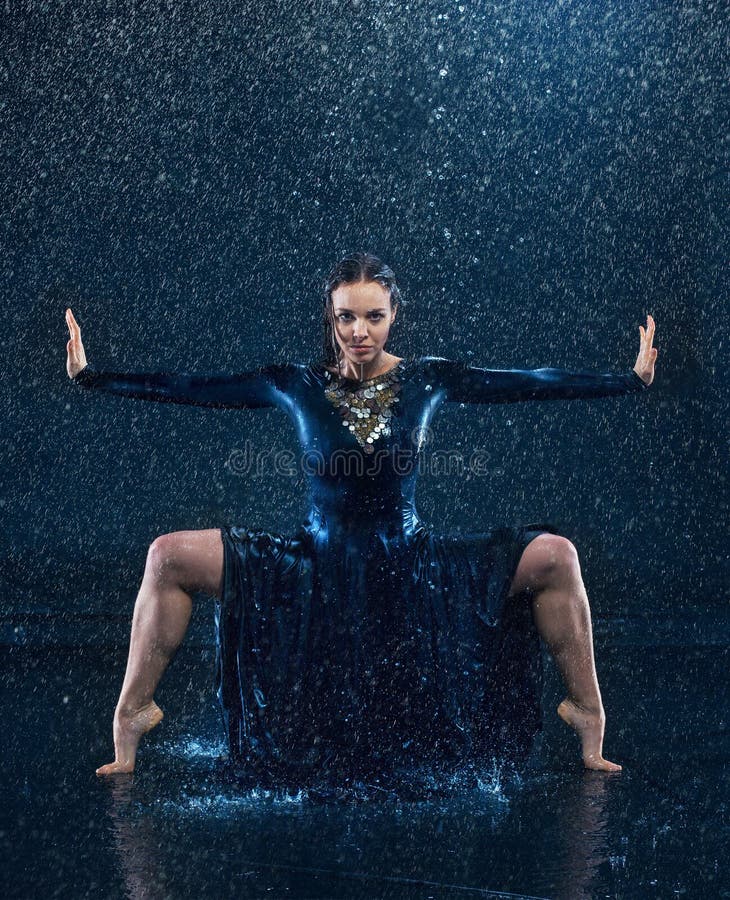 The Young Beautiful Modern Dancer Dancing Under Water Drops Stock Photo ...