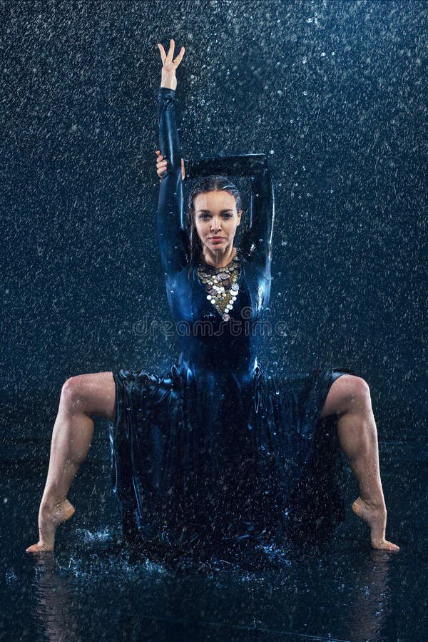 The Young Beautiful Modern Dancer Dancing Under Water Drops Stock Photo ...