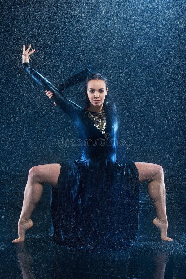 The Young Beautiful Modern Dancer Dancing Under Water Drops Stock Image ...