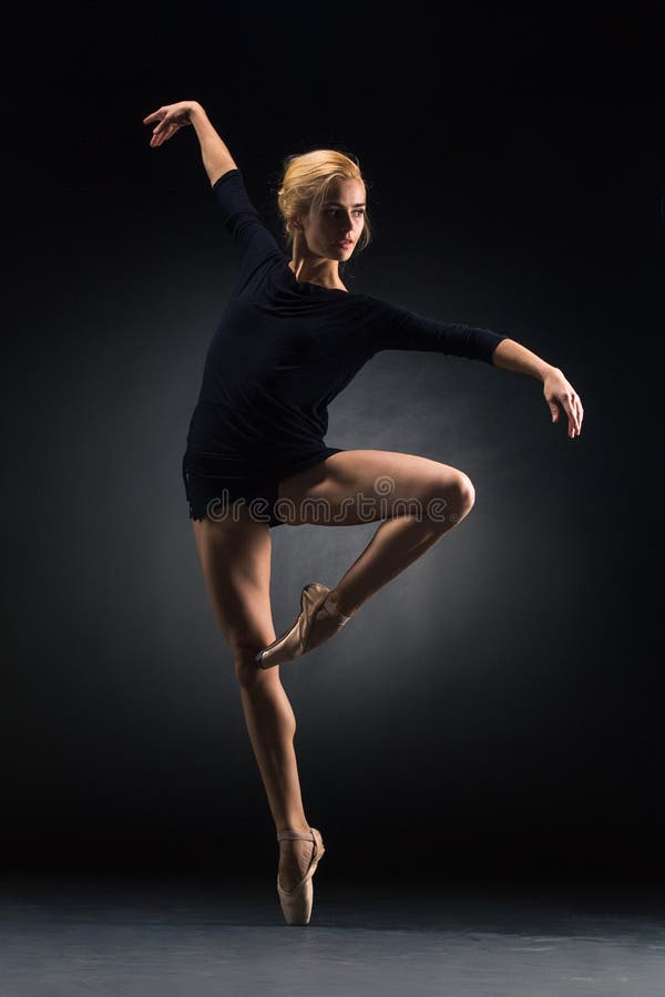 Young Beautiful Modern Style Dancer Posing on a Studio Background Stock ...