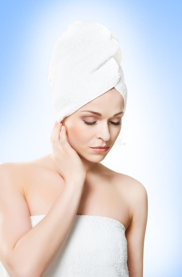 Young Beautiful And Natural Woman Wrapped In Towel Isolated On Stock