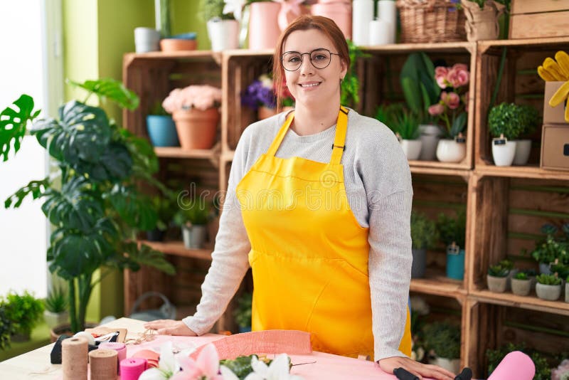 Young Beautiful Plus Size Woman Florist Smiling Confident Standing at ... Young Beautiful Plus Size Woman Florist Smiling Confident Standing at ...