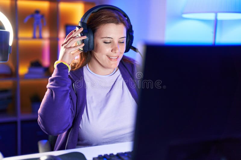 Young Beautiful Plus Size Woman Streamer Playing Video Game Using ...