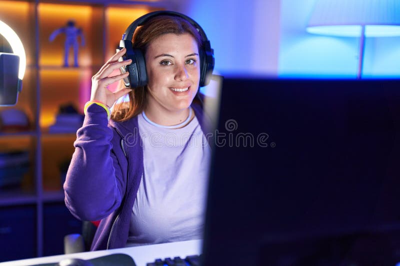 Young Beautiful Plus Size Woman Streamer Playing Video Game Using ...