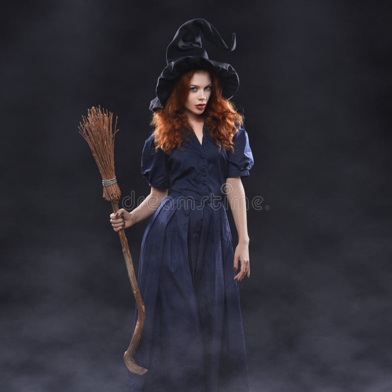 Young Beautiful Red-haired Witch in the Dark Fog Stock Photo - Image of ...