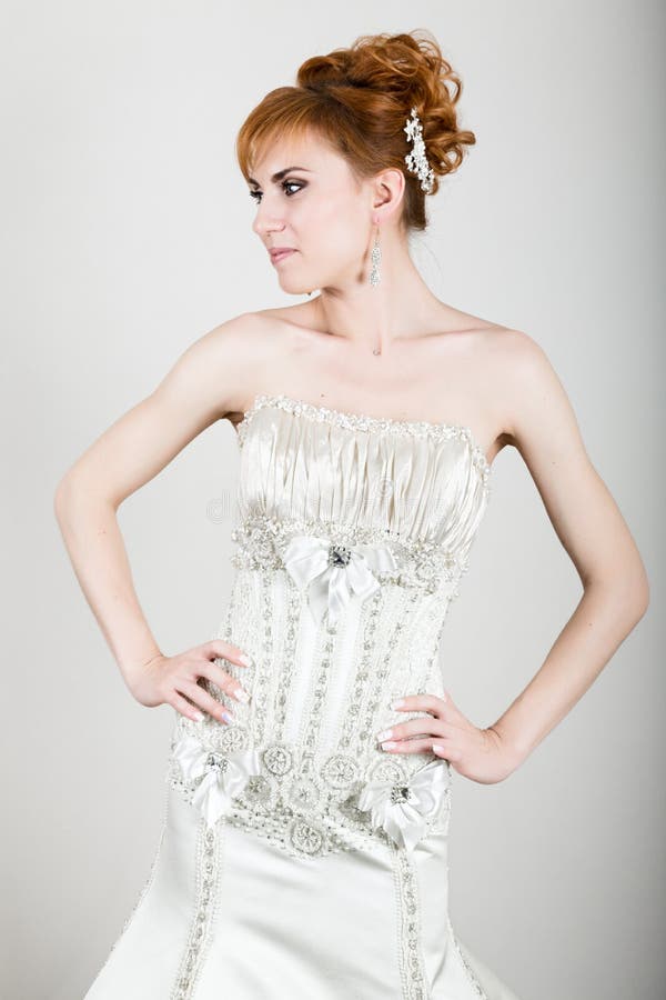 Young and Beautiful Redhead Bride Dressed Wedding Dress Posing in ...
