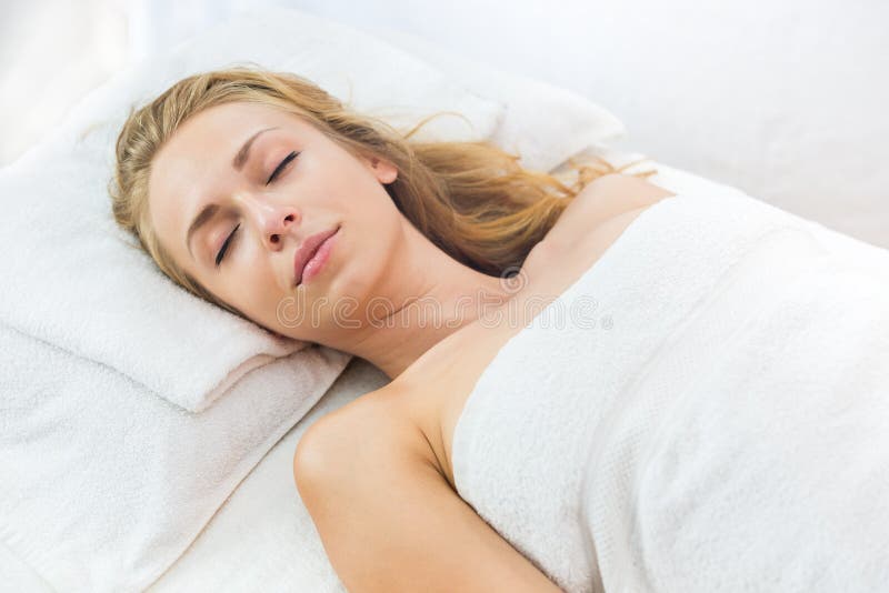 Young Beautiful and Relaxed Lady in Spa Treatment Stock Image - Image ...