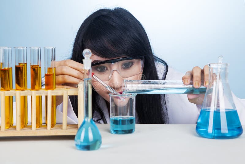 Scientist with chemicals stock photo. Image of concentration - 26450894