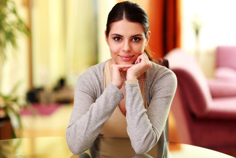 Young Beautiful Smiling Woman Sitting at the Table Stock Image - Image ...