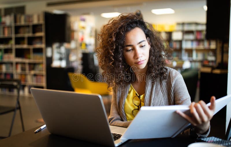 Young Beautiful Student Girl Working, Learning in College Library Stock ...
