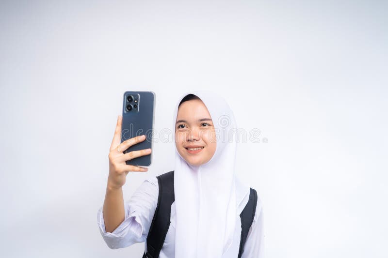 Young Beautiful Student Woman in White and Grey Uniform Taking Selfie ...