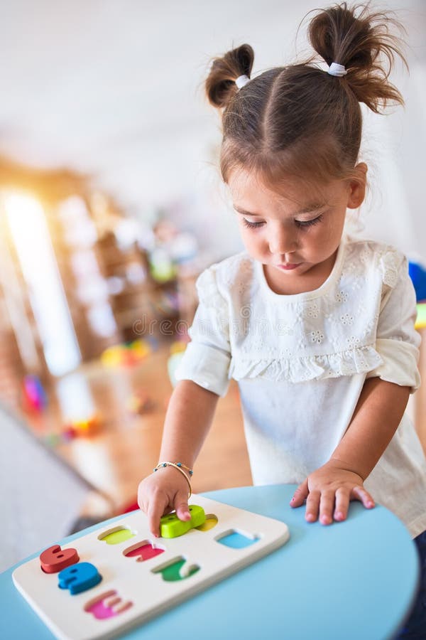 Young Beautiful Toddler Learning Mathematics Playing with Maths Game at ...