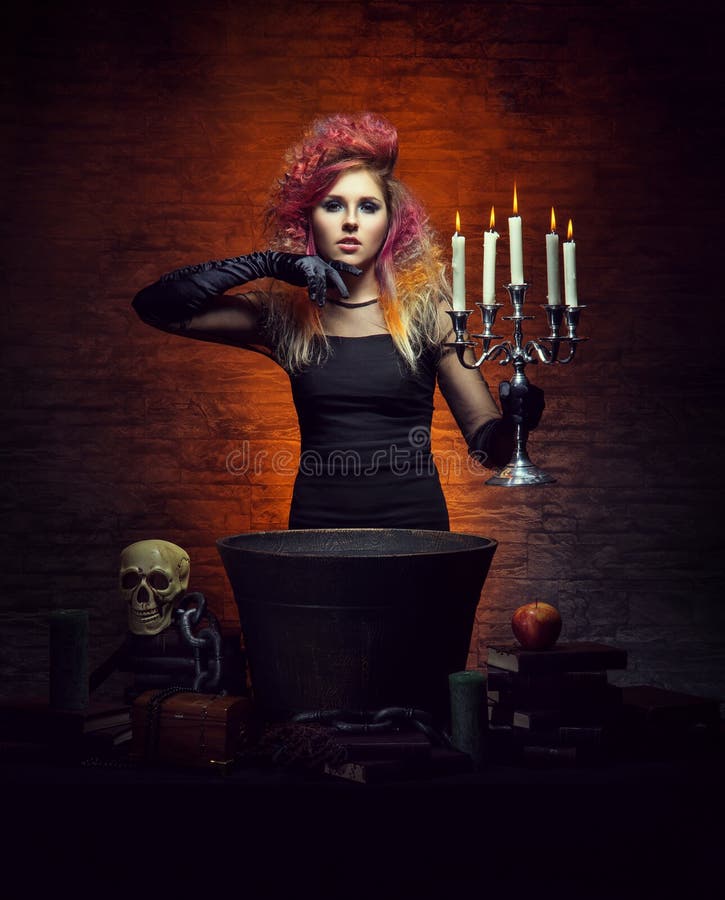 Young and Beautiful Witch Making Witchcraft in the Dungeon Stock Photo ...