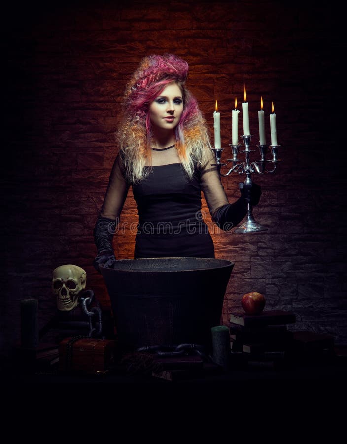 Young and Beautiful Witch Making Witchcraft in the Dungeon Stock Image ...