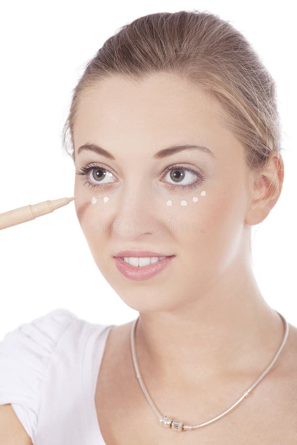 Young Beautiful Woman Applying Concealer on Face Stock Photo - Image of ...