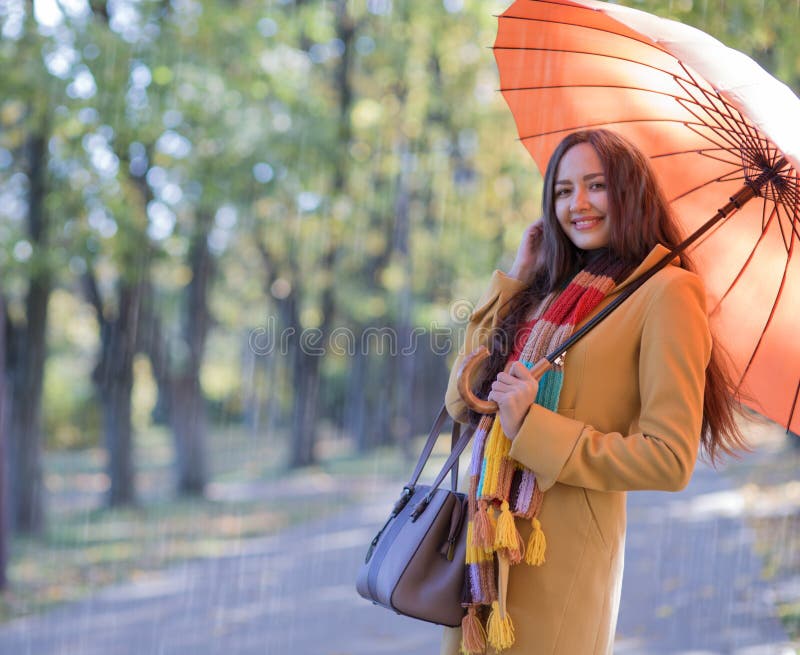 Beautiful Woman in Autumn Park Stock Photo - Image of brunette ...