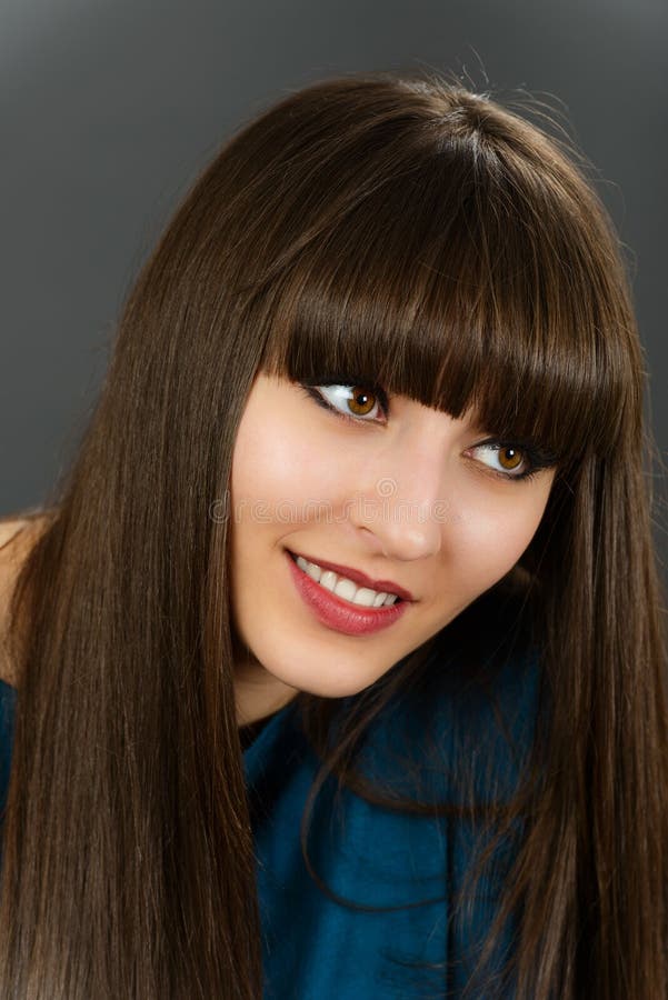 Young Beautiful Woman with Bangs in Studio Stock Image - Image of lips ...