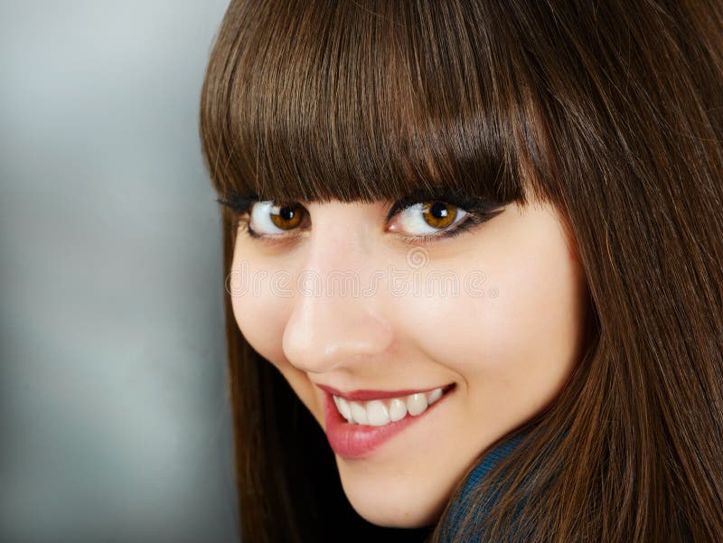 Young Beautiful Woman with Bangs in Studio Stock Photo - Image of ...