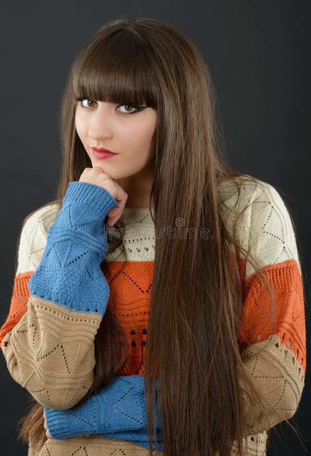 A Young Beautiful Woman with Bangs in Studio Stock Image - Image of ...