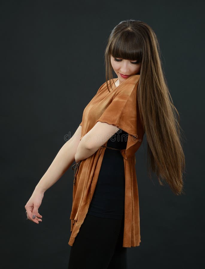 A Young Beautiful Woman with Bangs in Studio Stock Photo - Image of ...