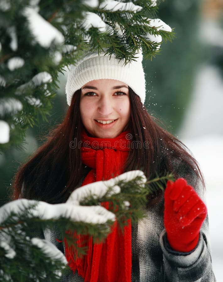 Young Beautiful Woman Behind Snow Covered Pine Stock Image - Image of ...