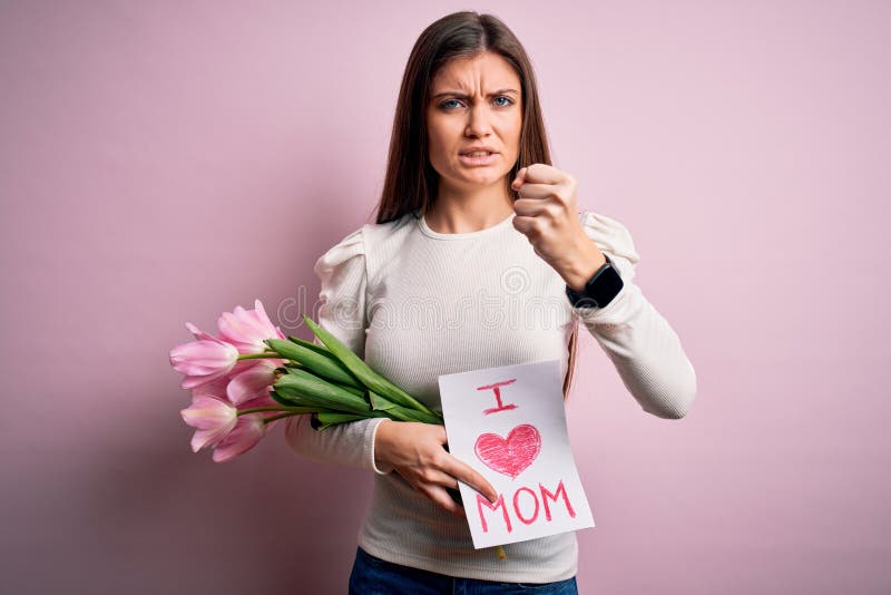 Young Beautiful Woman With Blue Eyes Holding Love Mom Message And