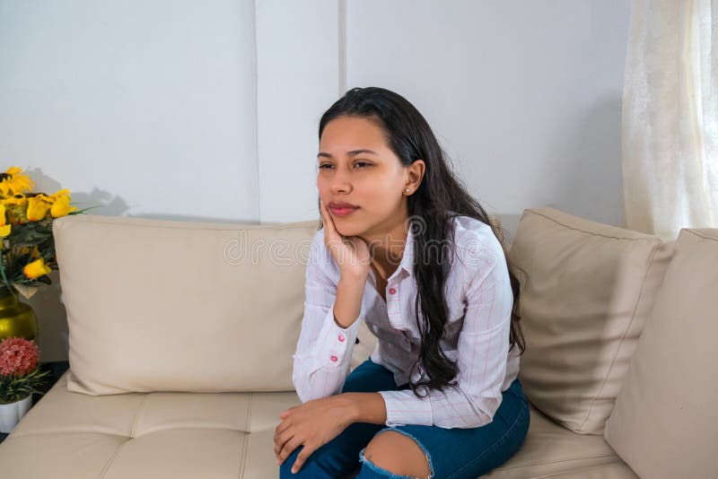 A Young and Beautiful Woman Concerned Stock Image - Image of hispanic ...