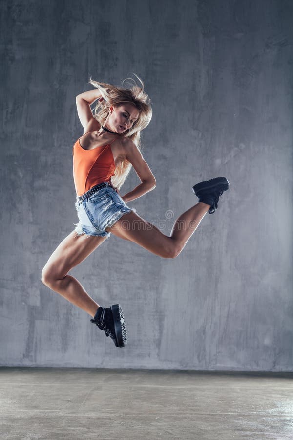 Young Beautiful Female Dancer is Posing in the Studio Stock Photo ...