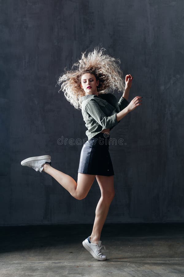 Young Beautiful Female Dancer is Posing in the Studio Stock Photo ...