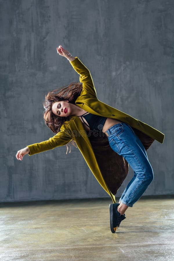 Young Beautiful Female Dancer is Posing in the Studio Stock Image ...