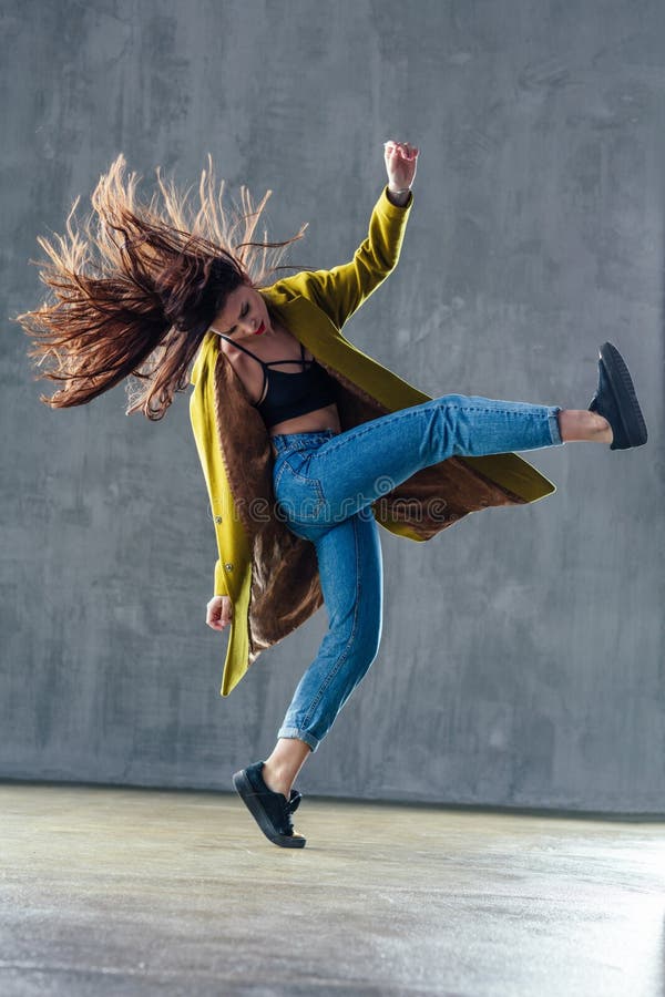 Young Beautiful Female Dancer is Posing in the Studio Stock Image ...