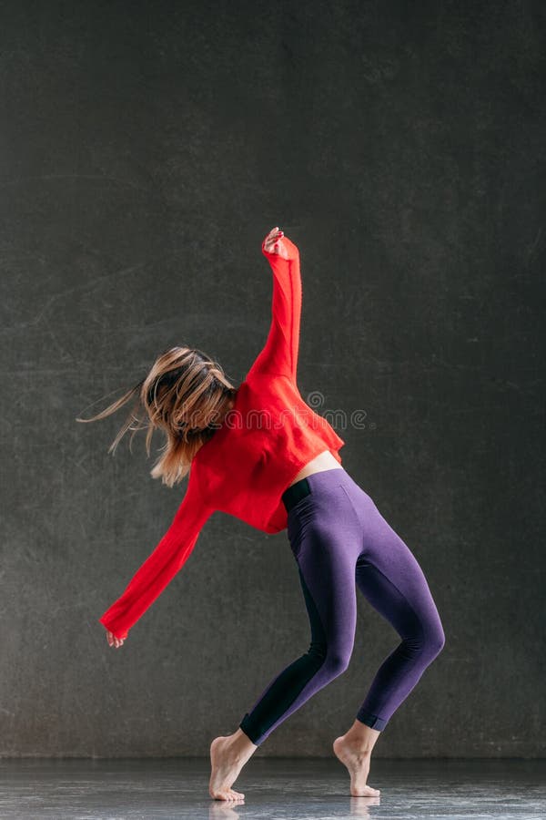 Young Beautiful Female Dancer is Posing in the Studio Stock Image ...