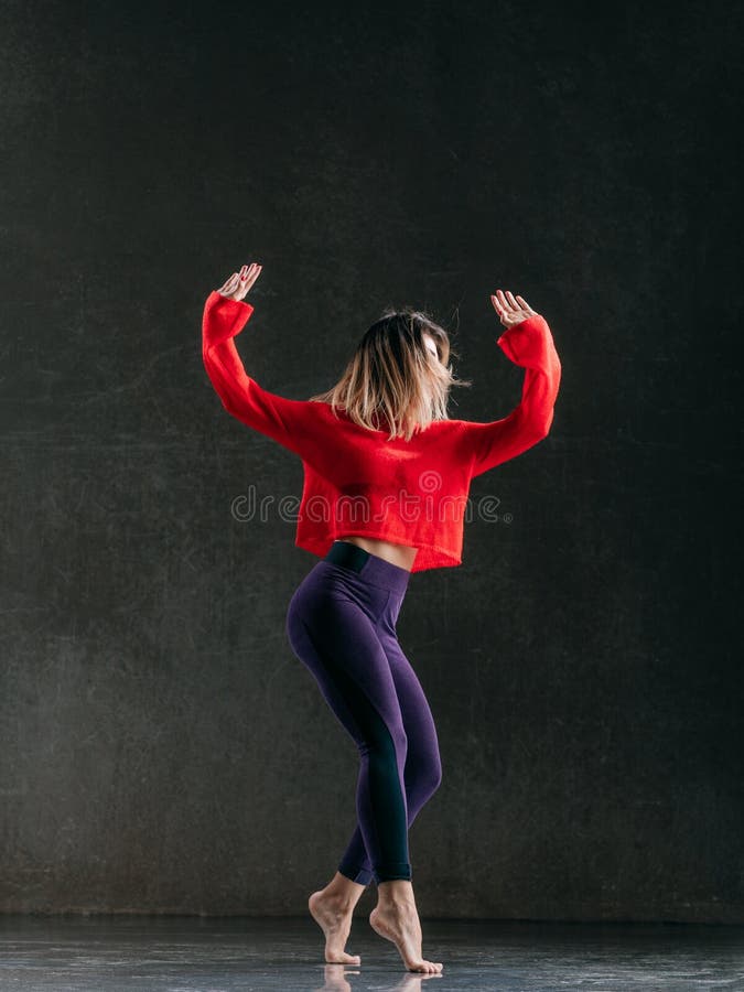 Young Beautiful Female Dancer is Posing in the Studio Stock Image ...