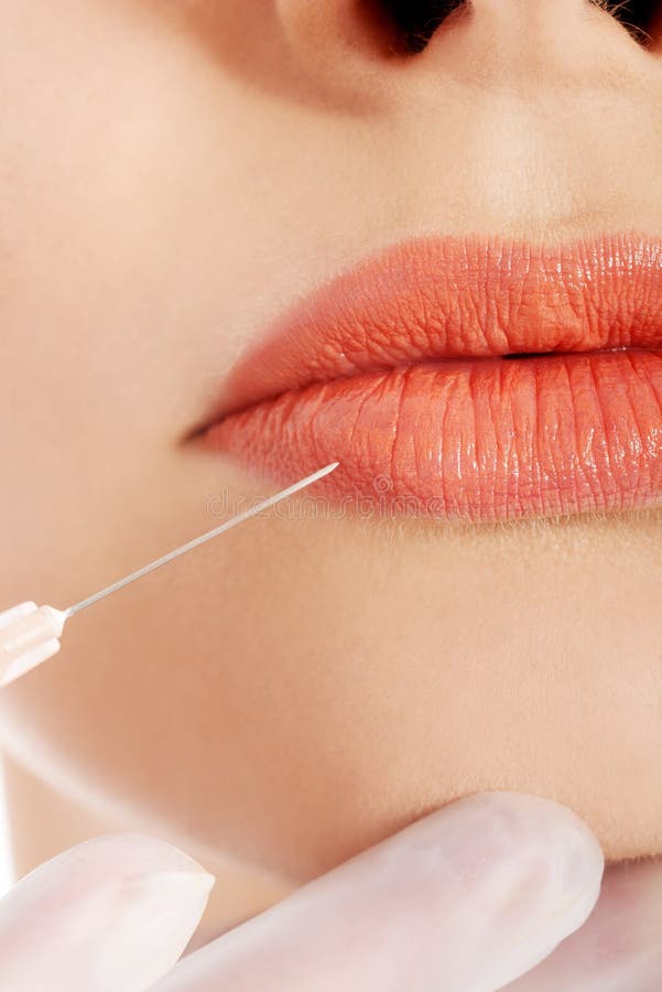 Young Beautiful Woman Doing Injection into Mouth. Stock Photo - Image ...